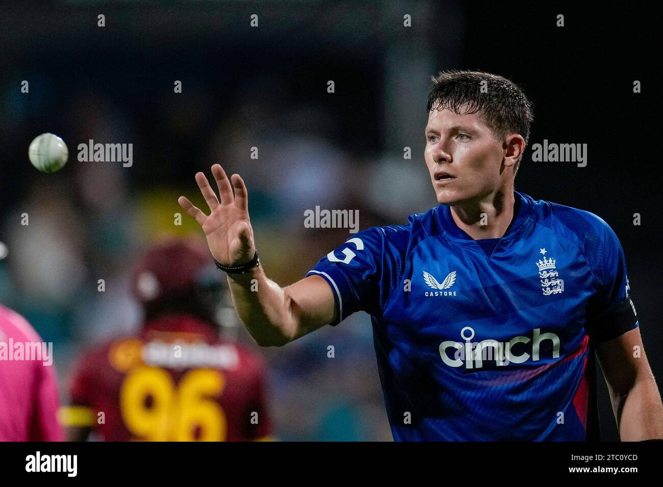 England's Matthew Potts receives the bal to bowl =against West Indies ...