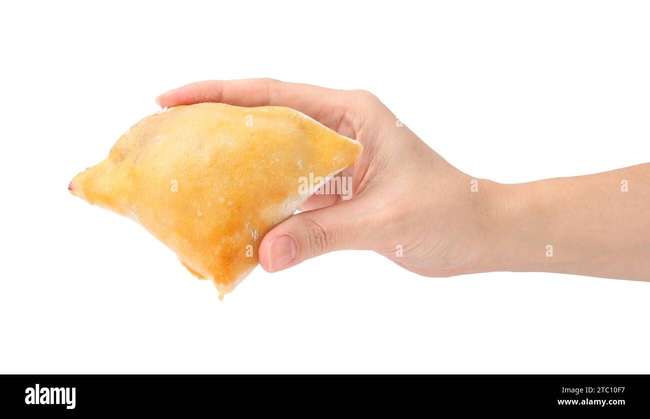 Woman holding delicious samosa on white background, closeup Stock Photo ...