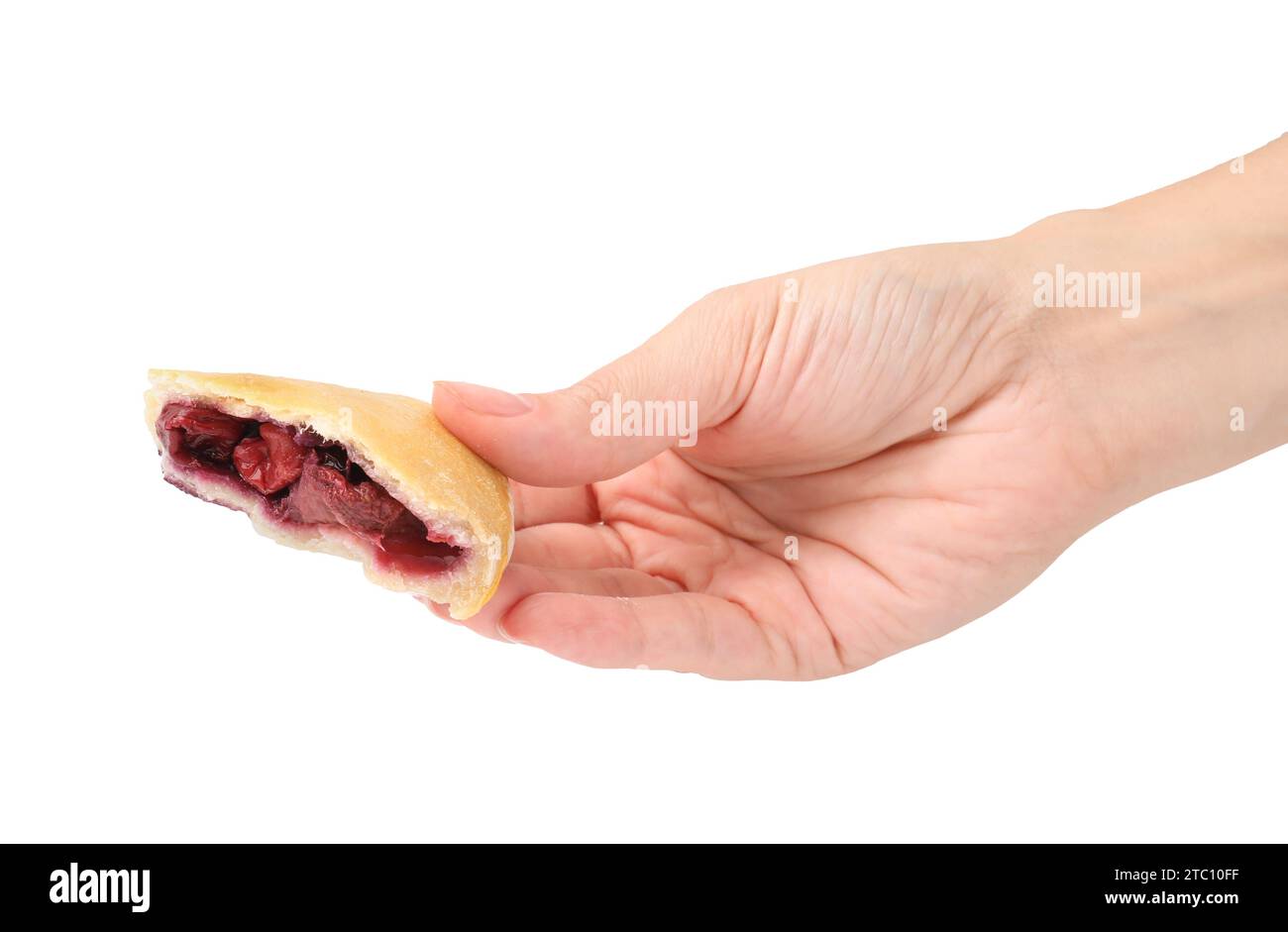 Woman holding delicious samosa with berry filling on white background ...