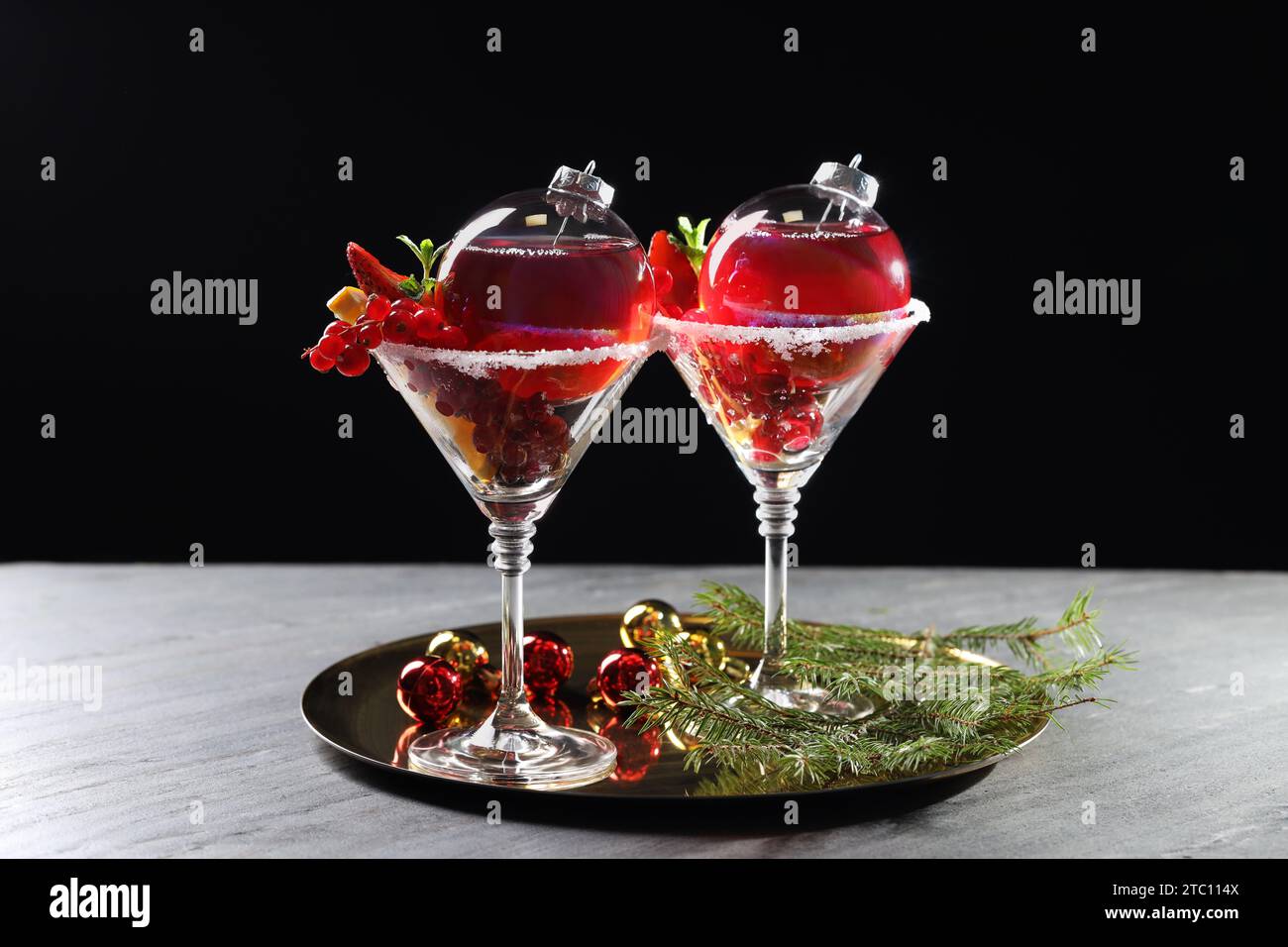 Creative presentation of Christmas Sangria cocktail in baubles and ...