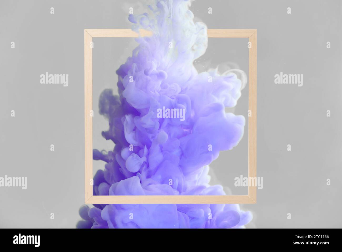 Splash of color ink and frame on grey background Stock Photo - Alamy