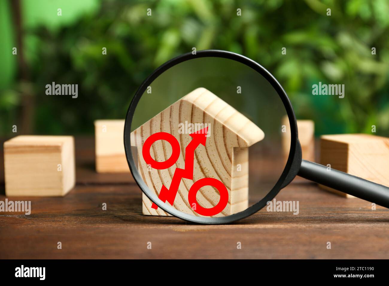 Mortgage rate rising illustrated by percent sign with upward arrow ...