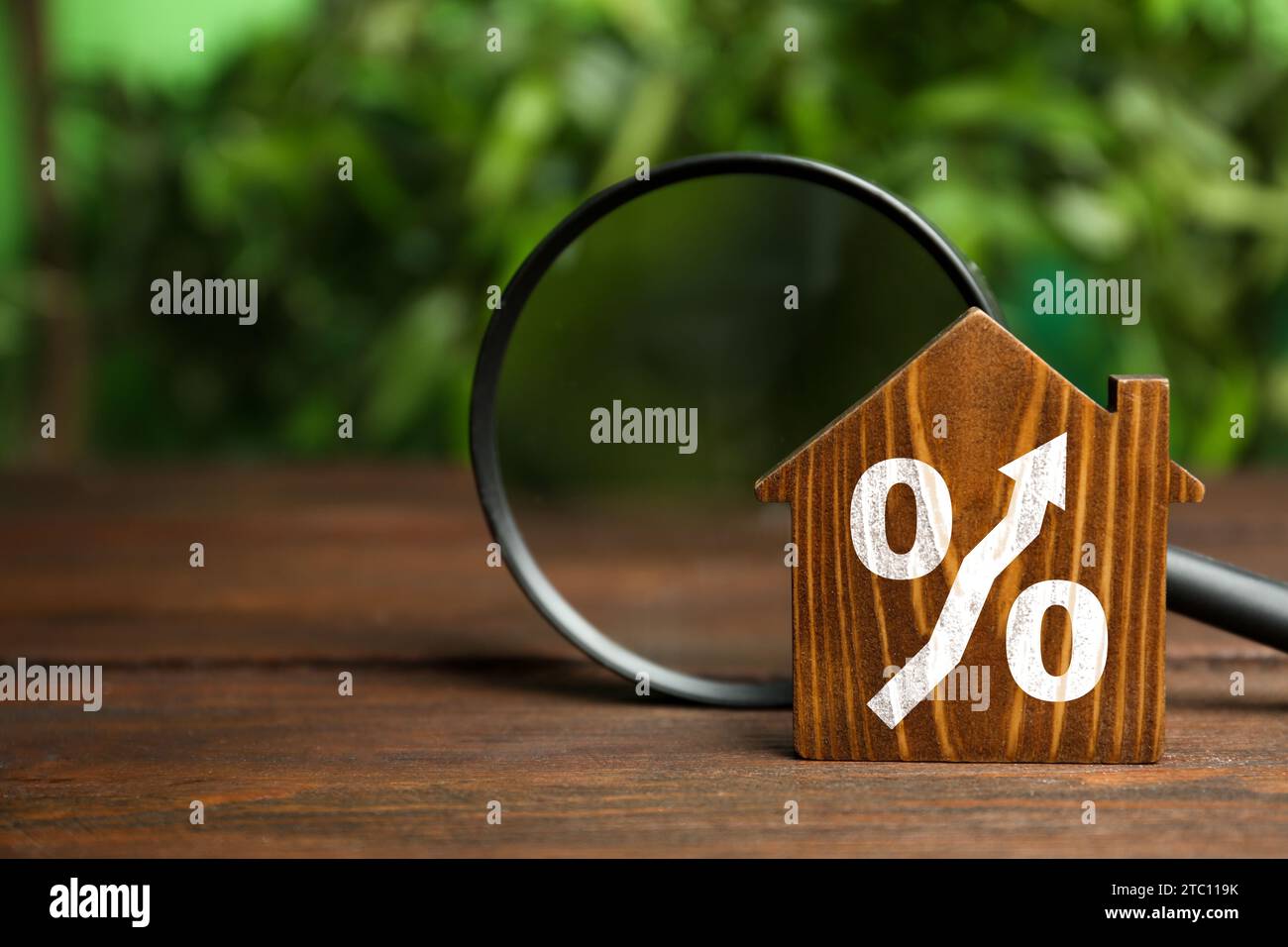 Mortgage rate rising illustrated by percent sign with upward arrow ...