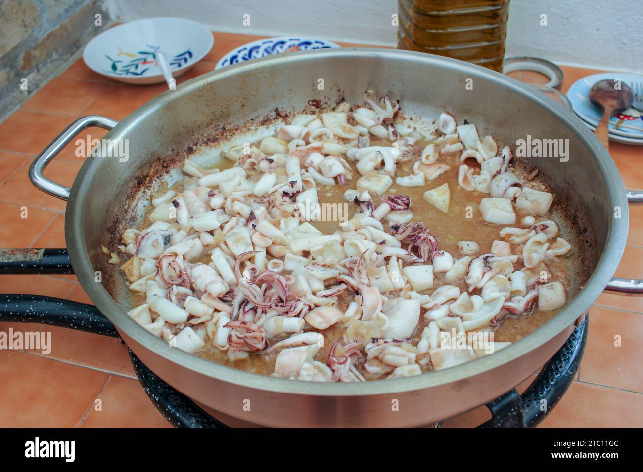 Gourmet Delight: Handcrafted Squid Ink Paella in the Making Stock Photo ...