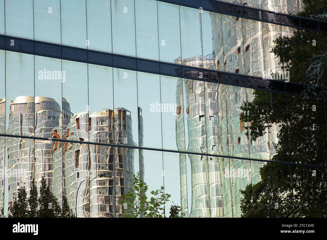 Closeup of abstract reflections on the glass windows of skyscrapers ...