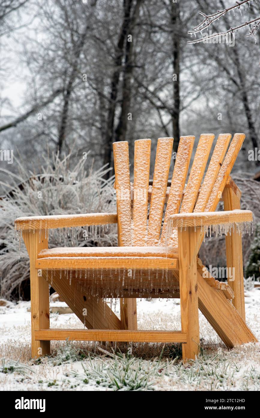 A chair covered with ice in a snow and ice storm Stock Photo - Alamy