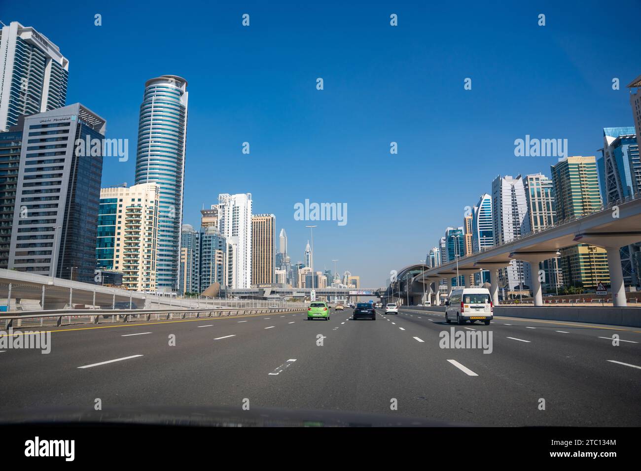 Dubai, UAE - December 1, 2023: View of the roadside from car windshield ...