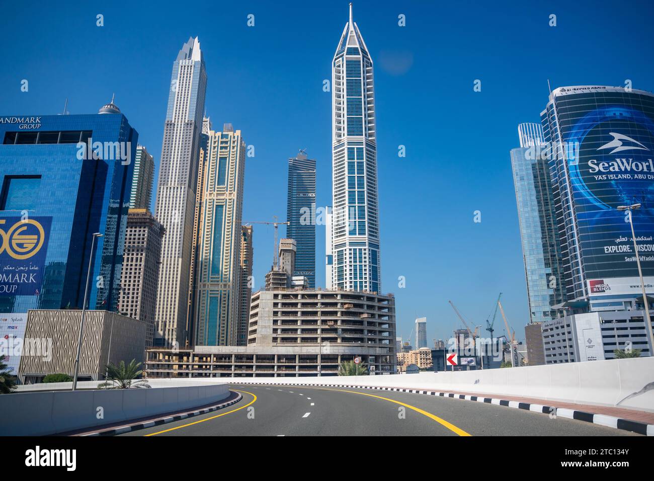 Dubai, UAE - December 1, 2023: View of the roadside from car windshield ...