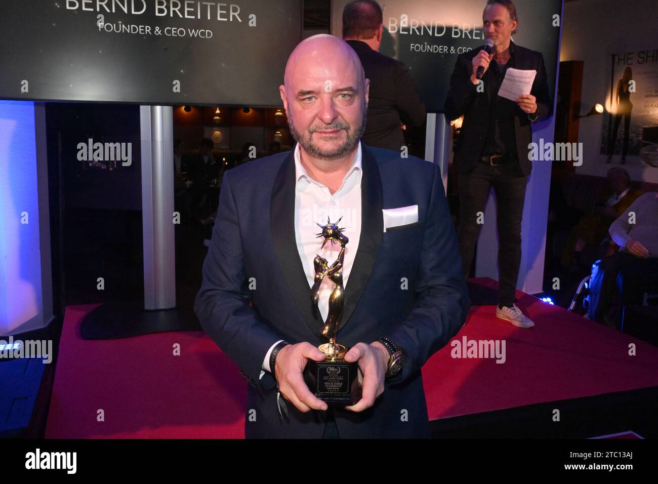 Munich, Germany. 09th Dec, 2023. Bernd Breiter, CEO WCD, stands in front of the stage at "The ...