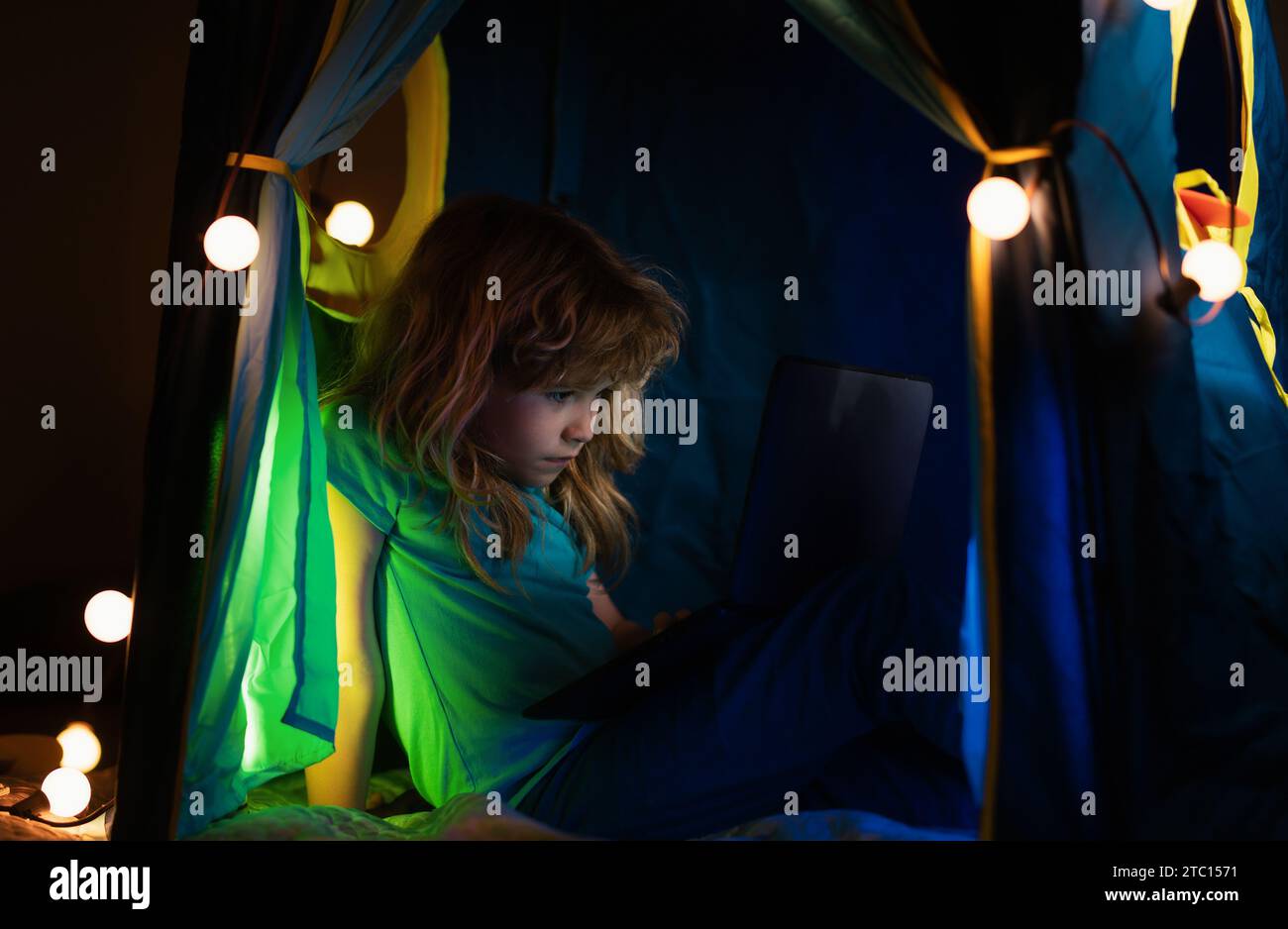Video game children playing with video games in their bedroom hi-res ...