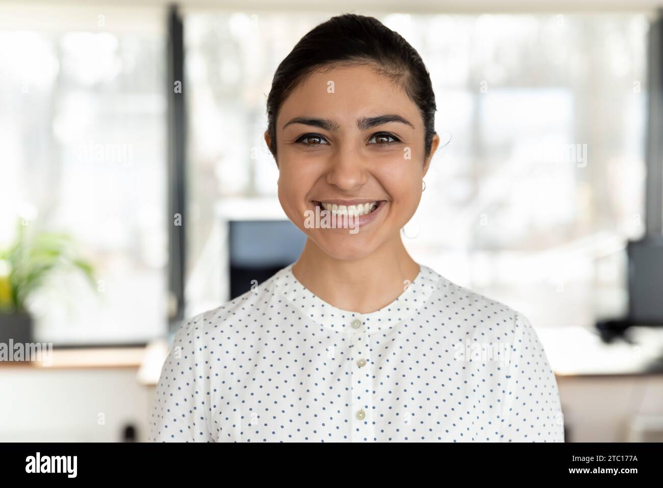 Headshot portrait of smiling indian female employee posing Stock Photo ...