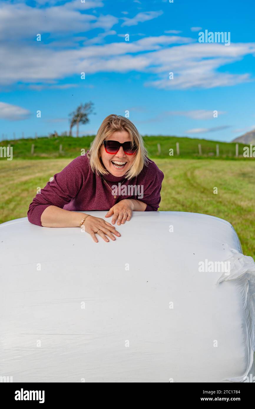 40-Year-Old Female Enjoying Serenity on Packed Hay in a Picturesque ...