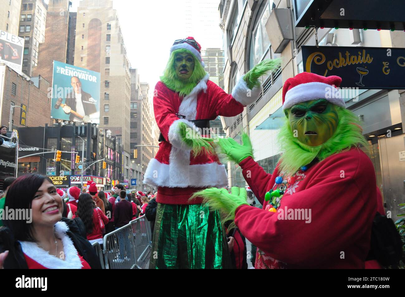 New York, United States. 09th Dec, 2023. Two people wearing Grinch ...