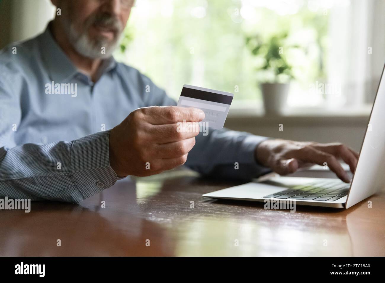 Pensioner customer desk hi-res stock photography and images - Alamy