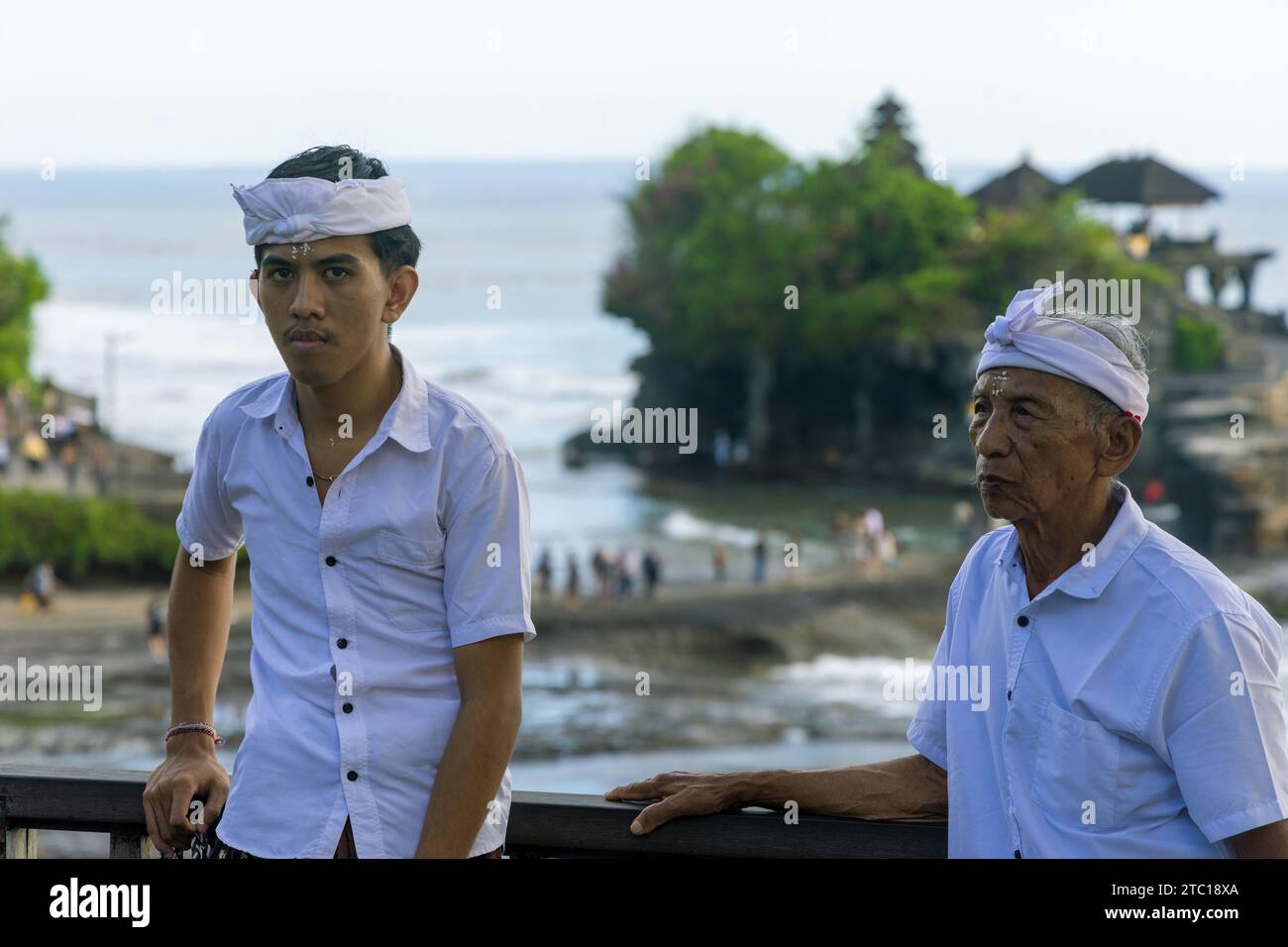 Balinese people in Tanah lot temple Bali, Indonesia Stock Photo - Alamy