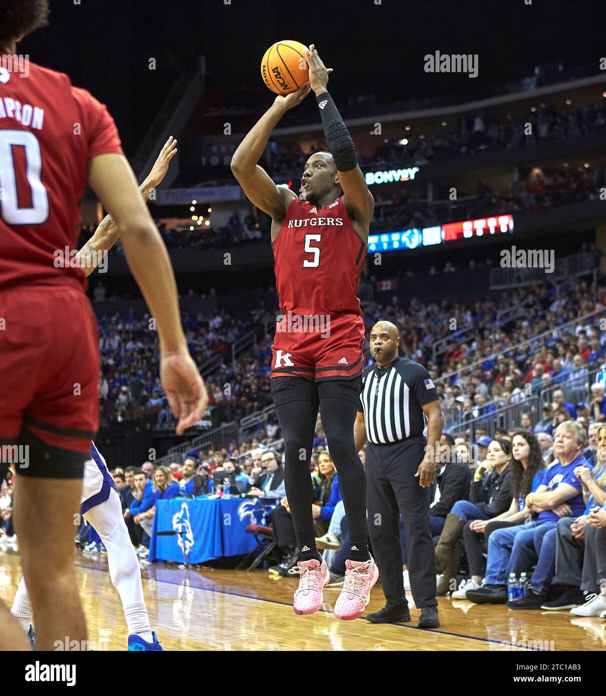 Rutgers Scarlet Knights forward Aundre Hyatt (5) shoots a three pointer ...