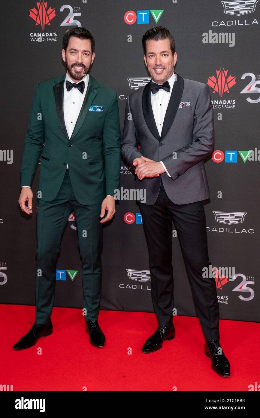 Toronto, Canada. 02nd Dec, 2023. Drew Scott, Jonathan Scott attend ...