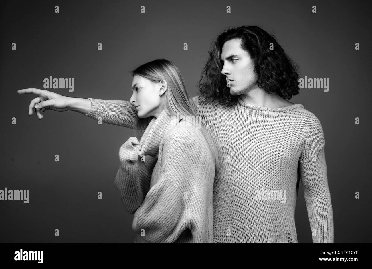 Portret of stylish confident male and female models with nature ...