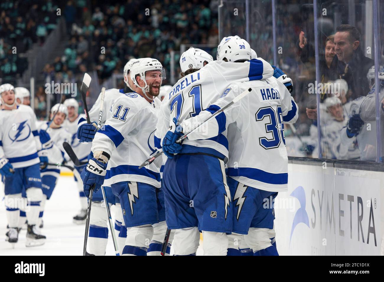 Tampa Bay Lightning center Luke Glendening (11) joins center Anthony ...