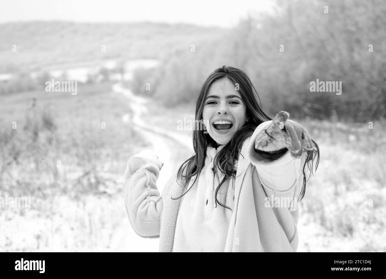 Snowball game in happy winter. Playing with snow and having fun in ...