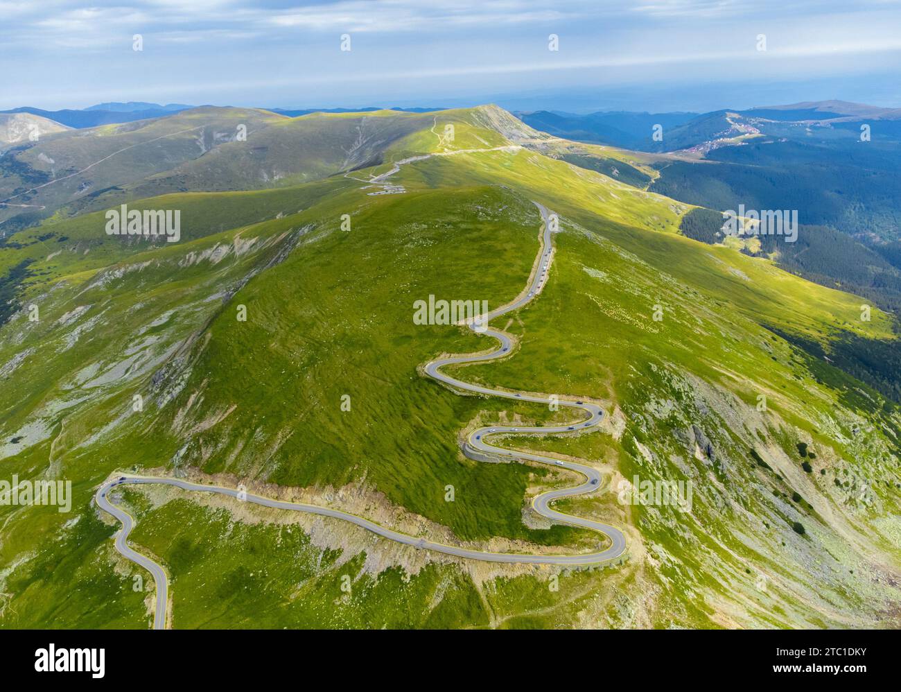 An aerial view of the winding two-lane Transalpina Road in Romania ...