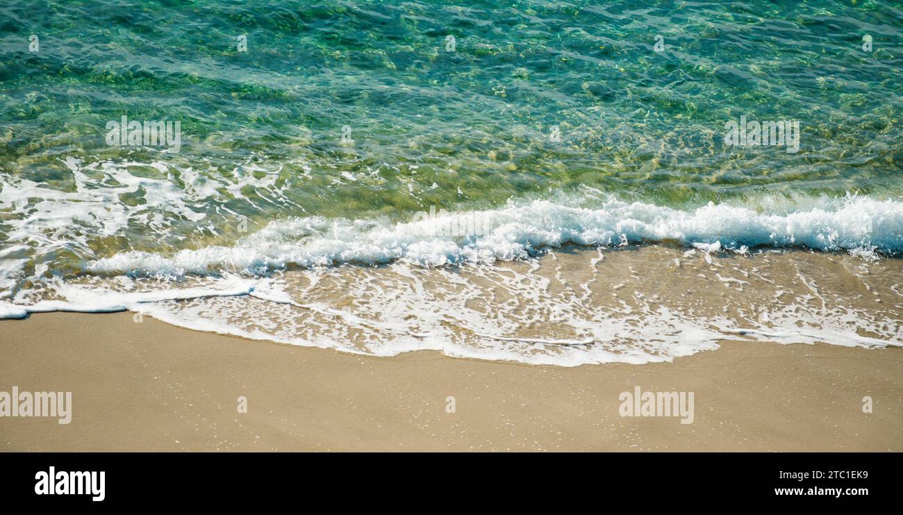 Summer beach, ocean waves on a tropical sea with deep blue wawes. Calm ...