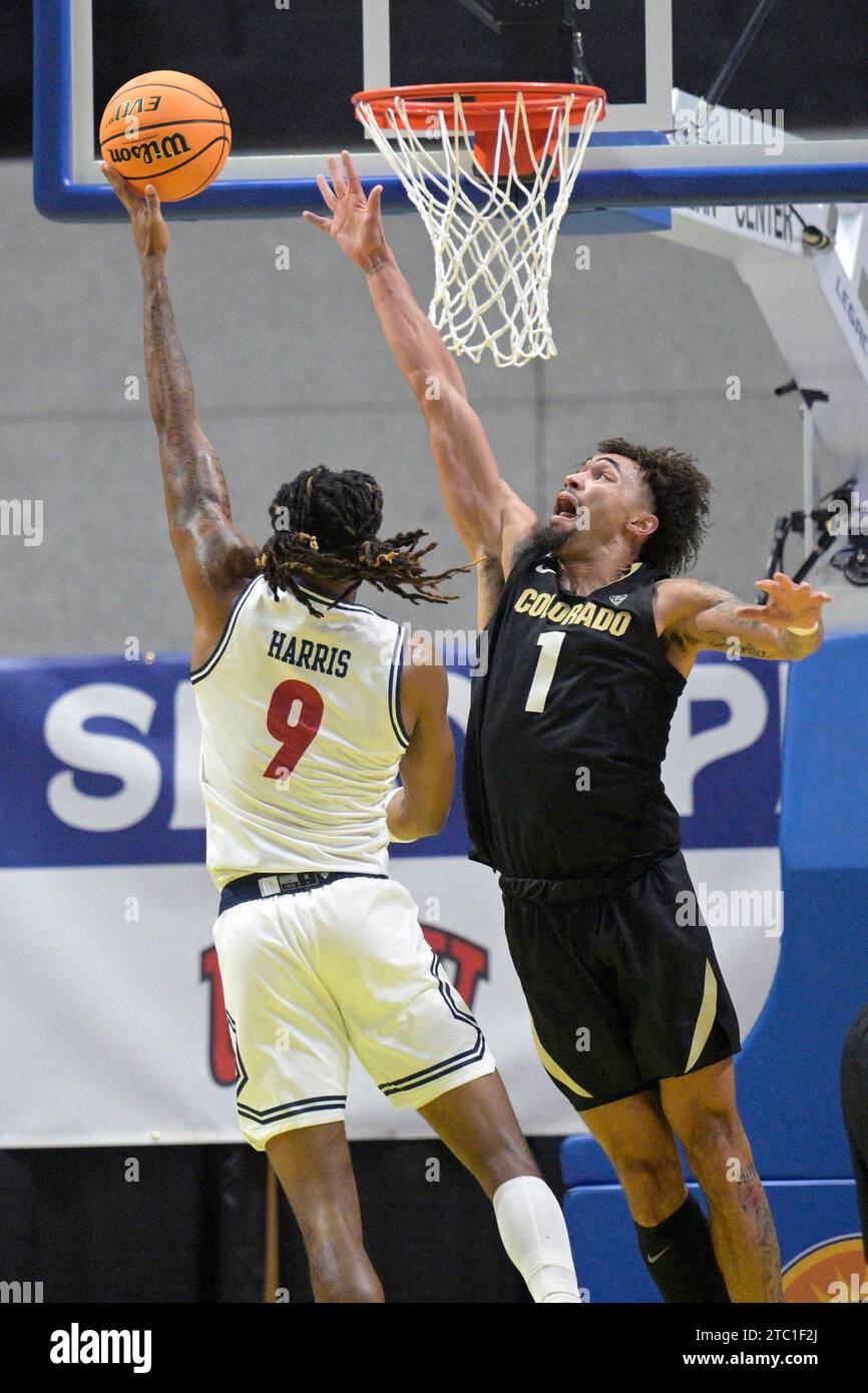 Richmond forward Tyler Harris (9) shoots in front of Colorado guard J ...