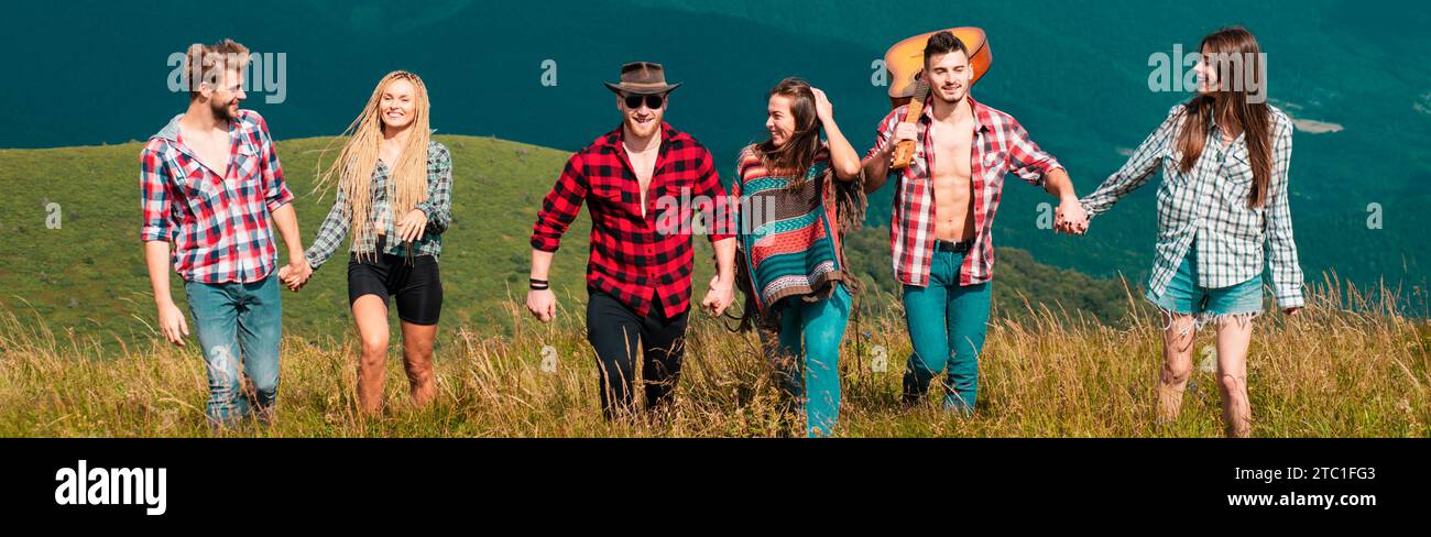 Group people in a hike through the mountains. Friends on a camping trip ...