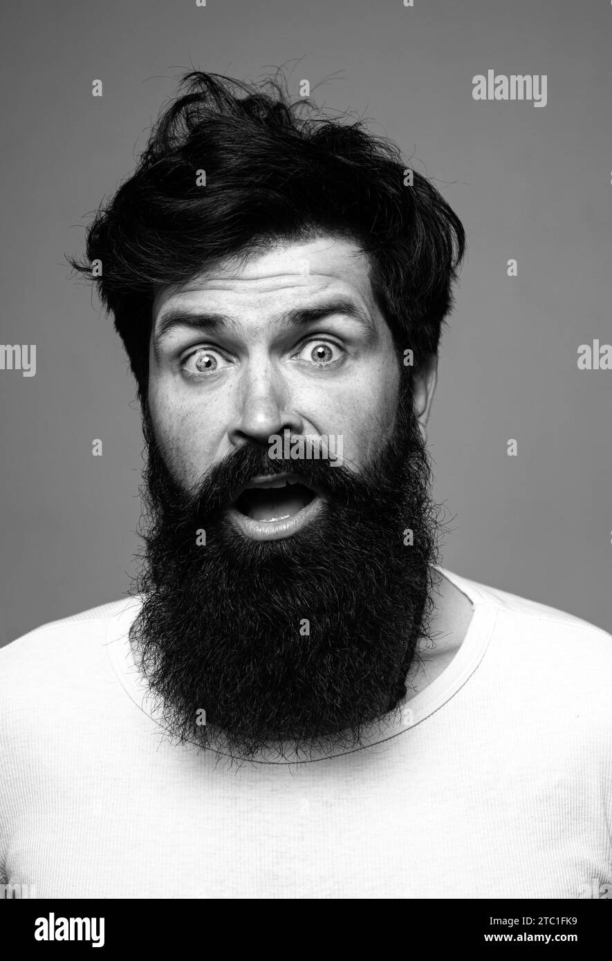 Bearded stylish businessman is surprised. Shocked man with surprise ...