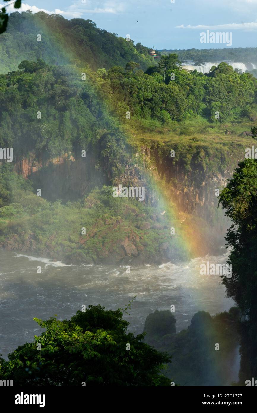 rainbow from water spray. iguazu falls national park from upper trail ...