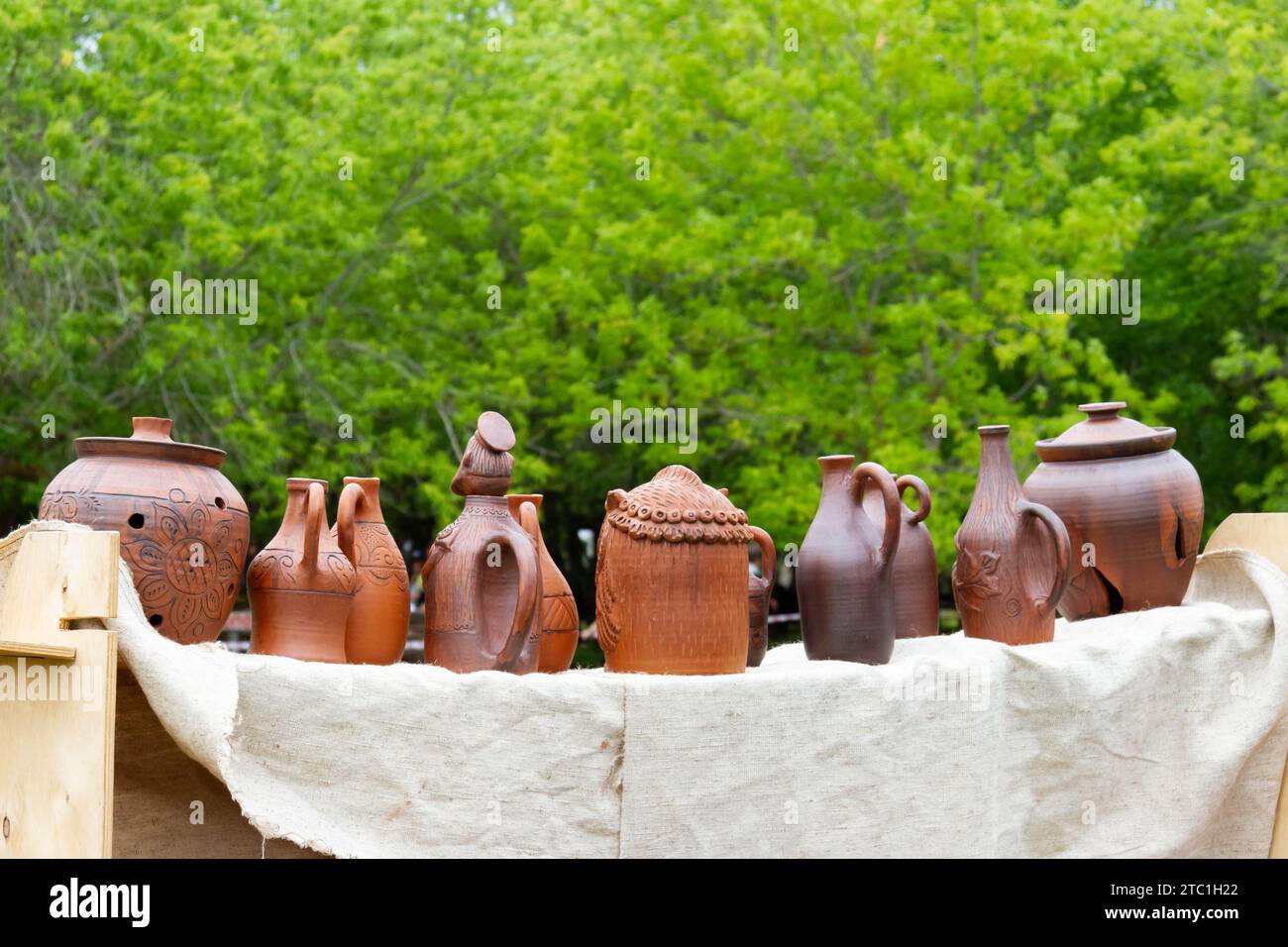 Exhibition of pottery. Pottery. Set of clay pots. The ancient art of ...
