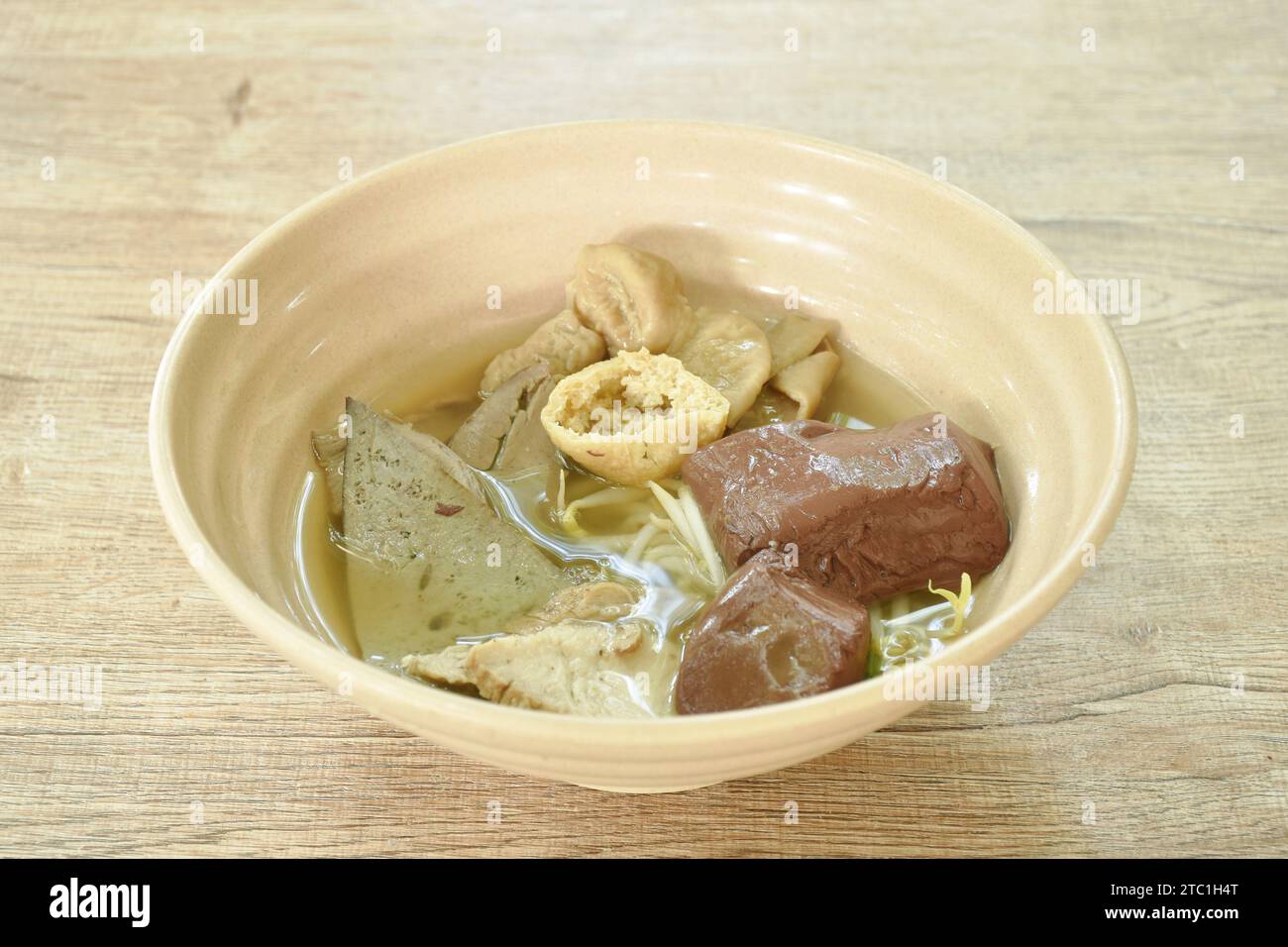 boiled pork blood and entrails with bean sprout in clear soup on bowl ...
