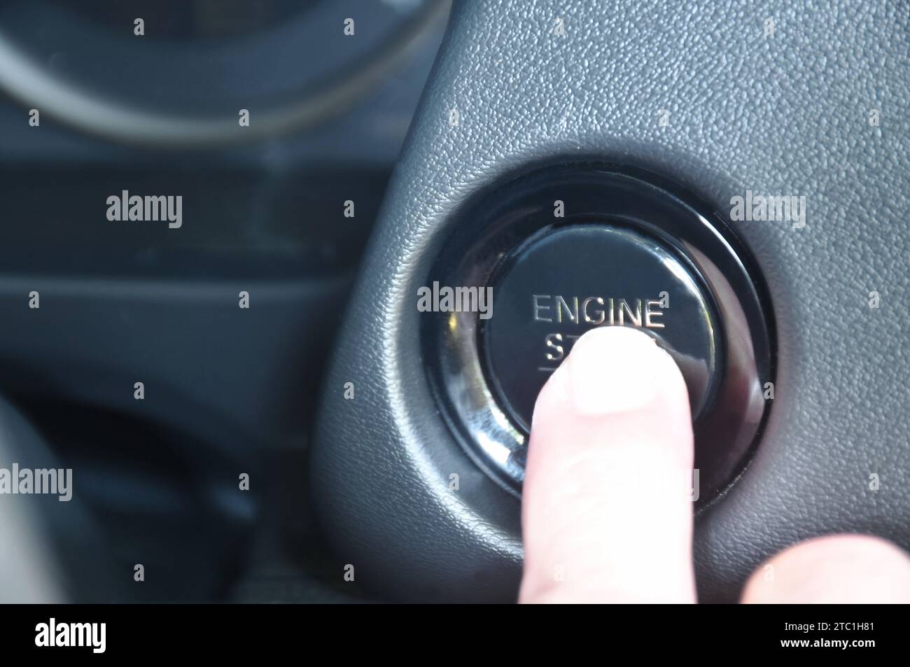 car engine start by finger pushing button in cockpit Stock Photo - Alamy