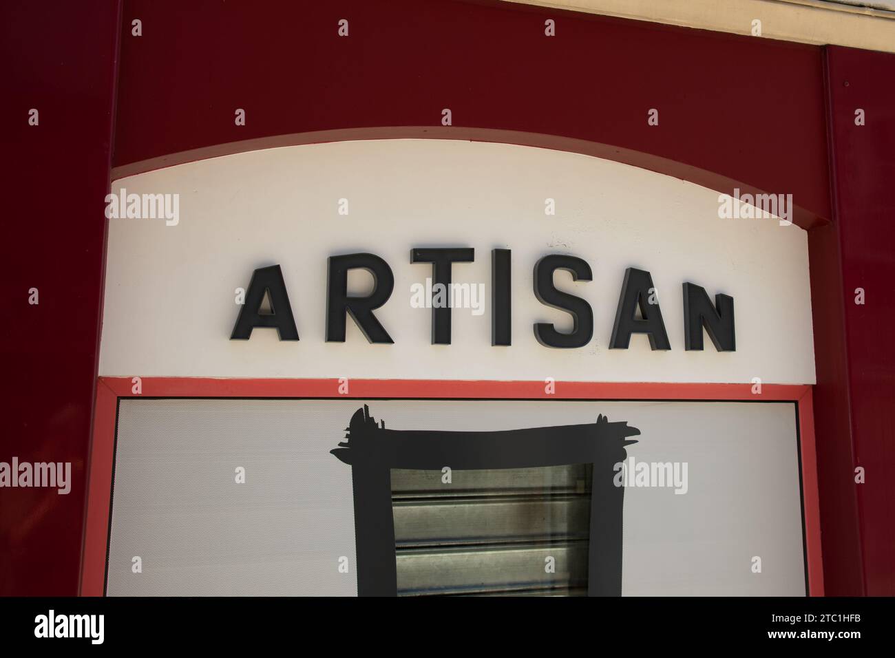 artisan sign french text means craftsman in facade wall entrance shop ...