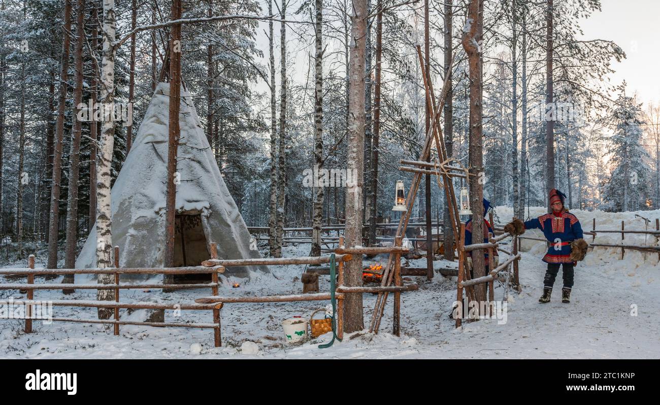 Rovaniemi, Finland - November 28, 2010: Two Sami people near their ...
