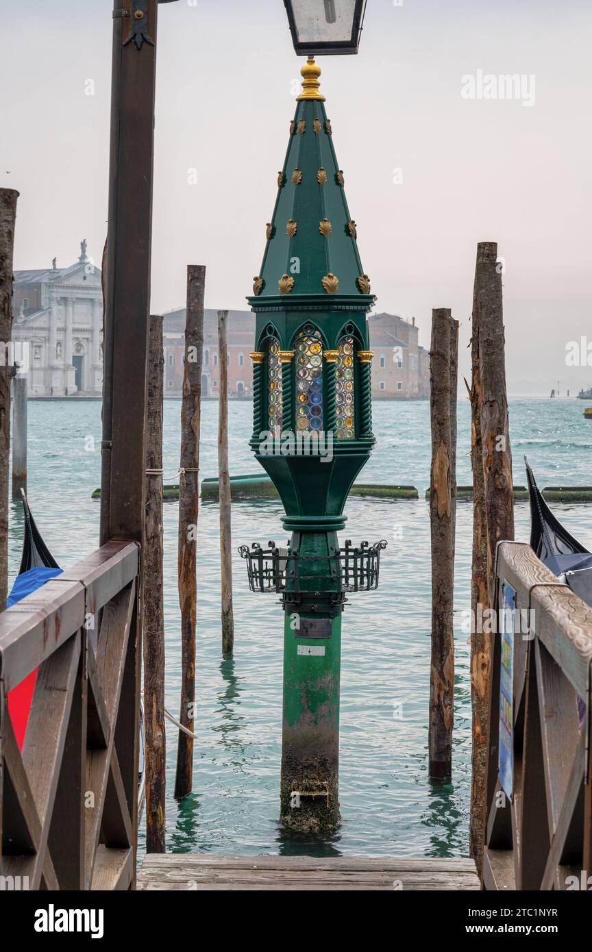 Old Canal light at Traghetto Gondole Molo in Venice Stock Photo - Alamy