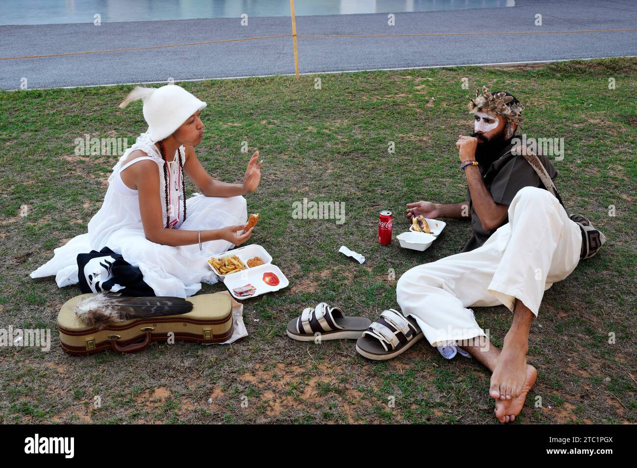 Mesiah Ebony Burciaga-Hameed, left, eats lunch with Jack Collard, of ...