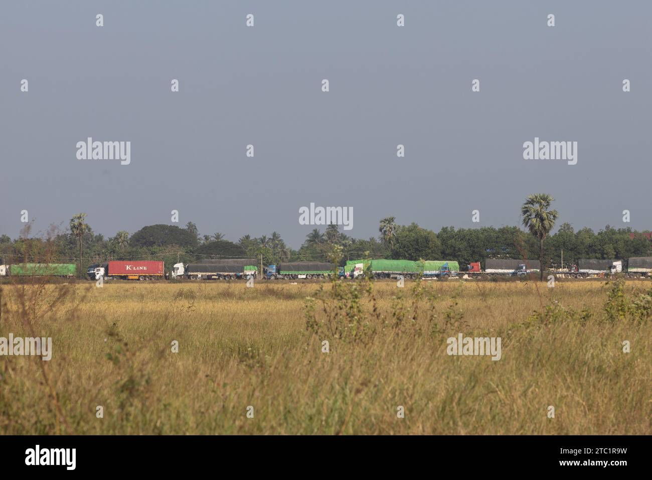 Kawkareik, Myanmar. 10th Dec, 2023. More than a hundred Trucks were ...