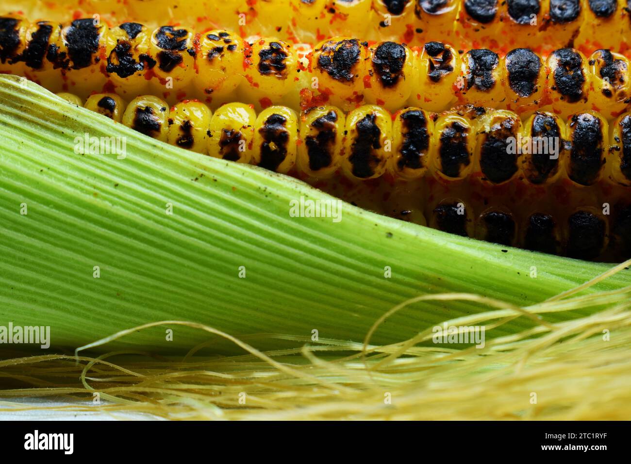 Fresh roasted corn in ambient background Stock Photo - Alamy