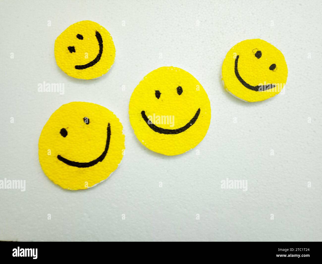 Crafted smiley face icons against white background. Happy, joy, smiling ...