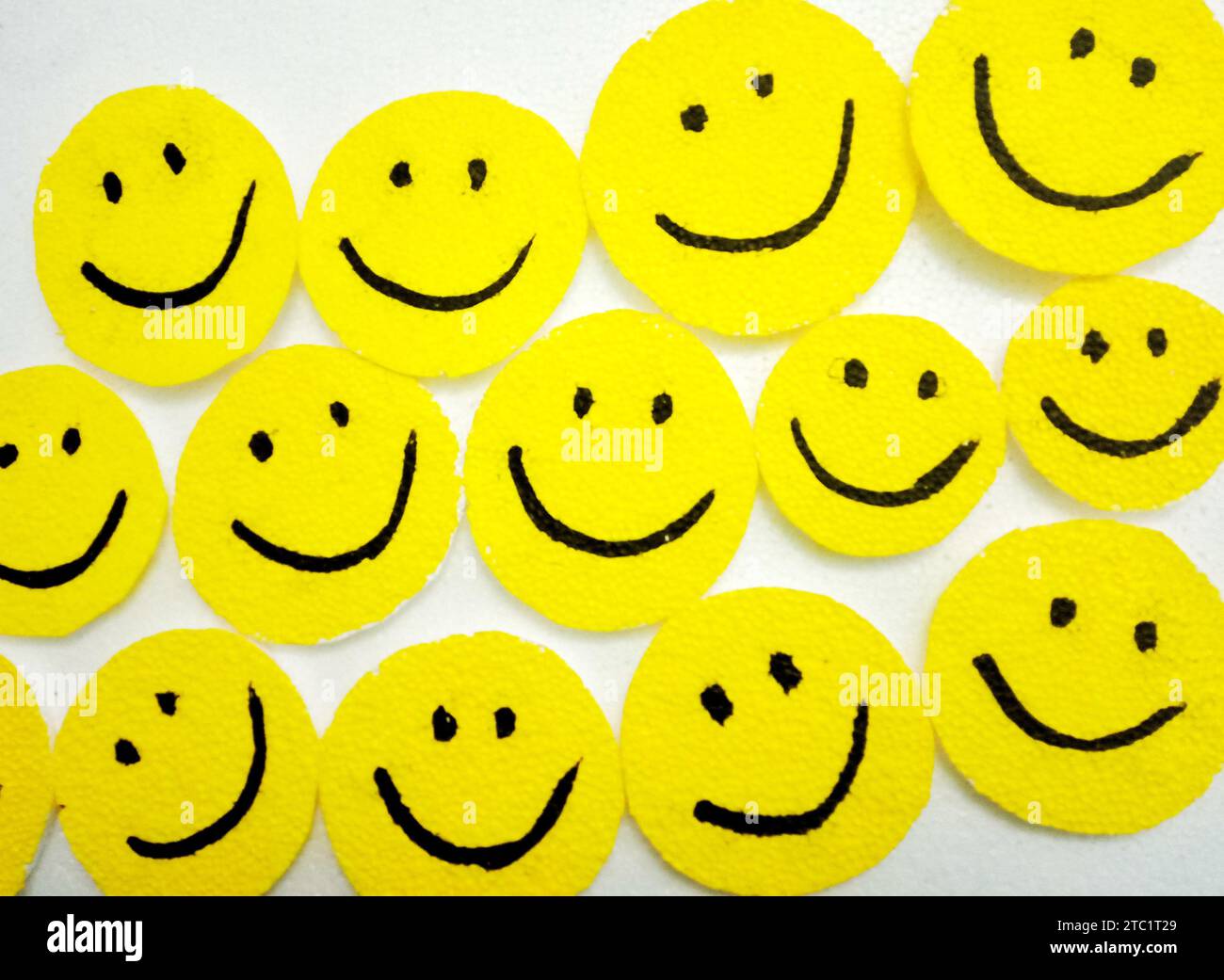 Crafted smiley face icons against white background. Happy, joy, smiling ...