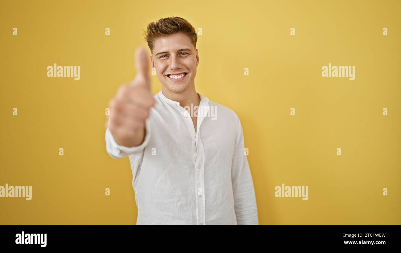 Happy young caucasian man, confidently standing, flashing a huge ...