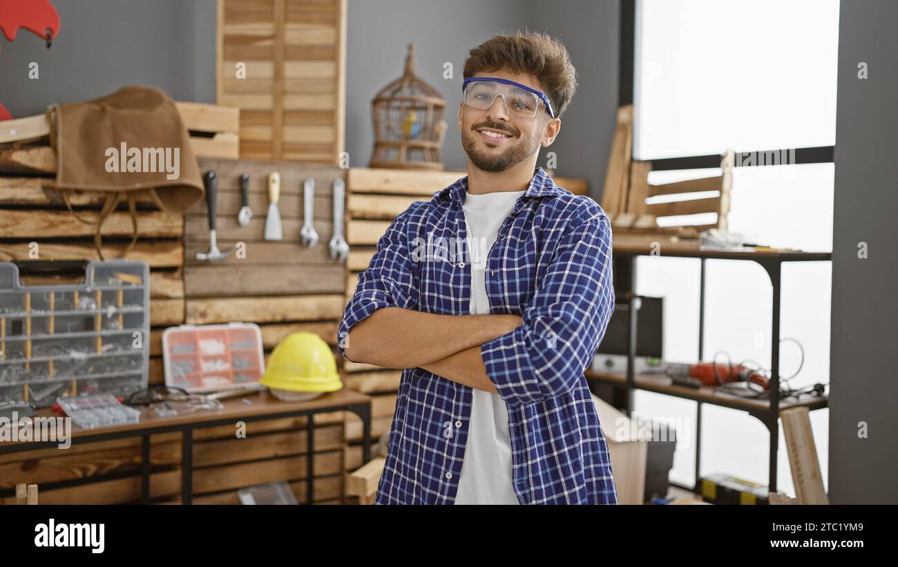 Handsome young carpenter arms hi-res stock photography and images - Alamy
