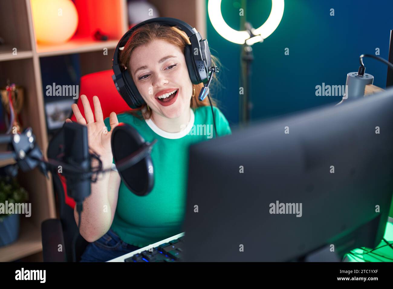 Young Redhead Woman Streamer Smiling Confident Having Video Call At 5588