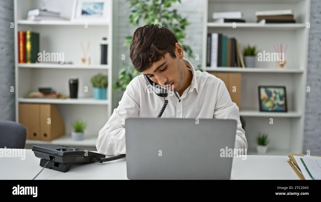 Captivating portrait of a young, handsome hispanic man engrossed in a ...