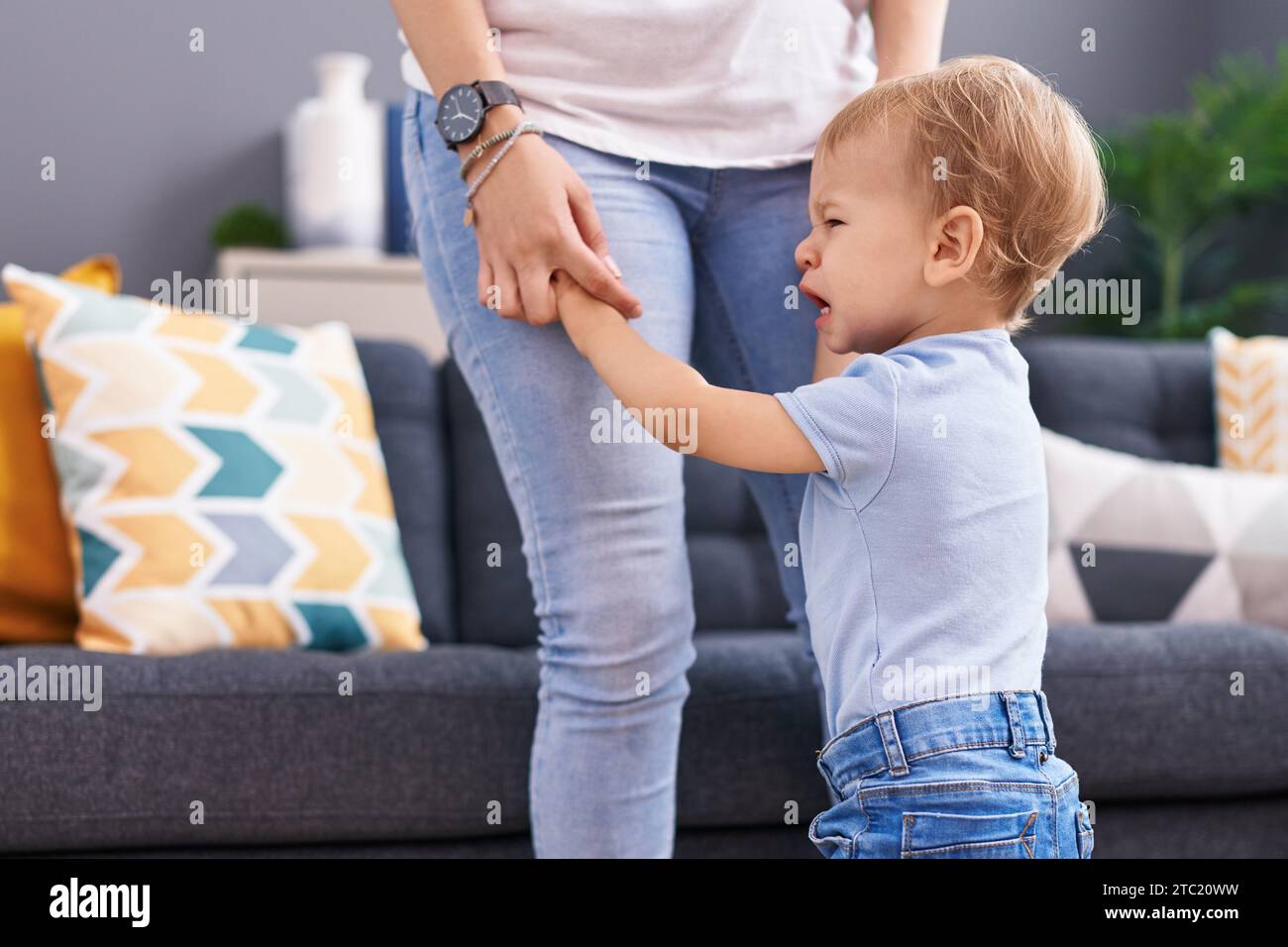 Mother and son crying at home Stock Photo - Alamy