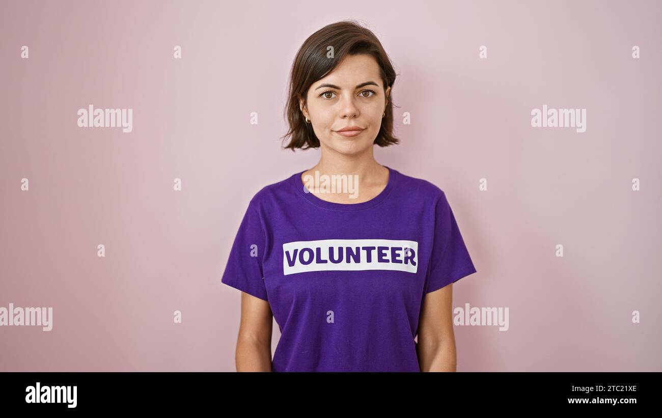 Stunning young hispanic woman, a volunteer working tirelessly on ...