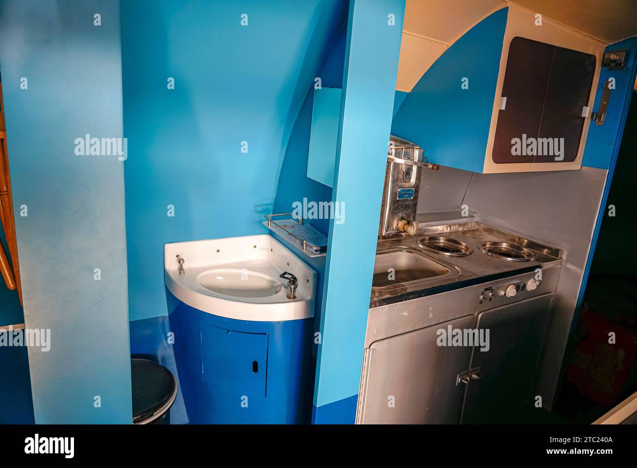bathroom and kitchen on a Dakota DC-3L ??passenger plane flying between ...