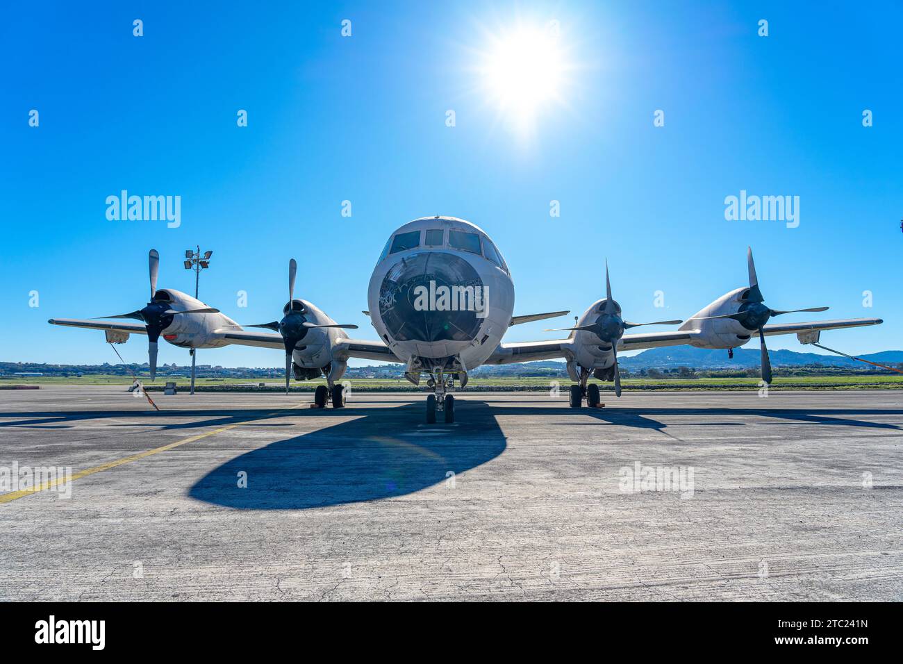 4-engine propeller plane on the runway of the N1 air base in Pero Pinheiro Stock Photo - Alamy
