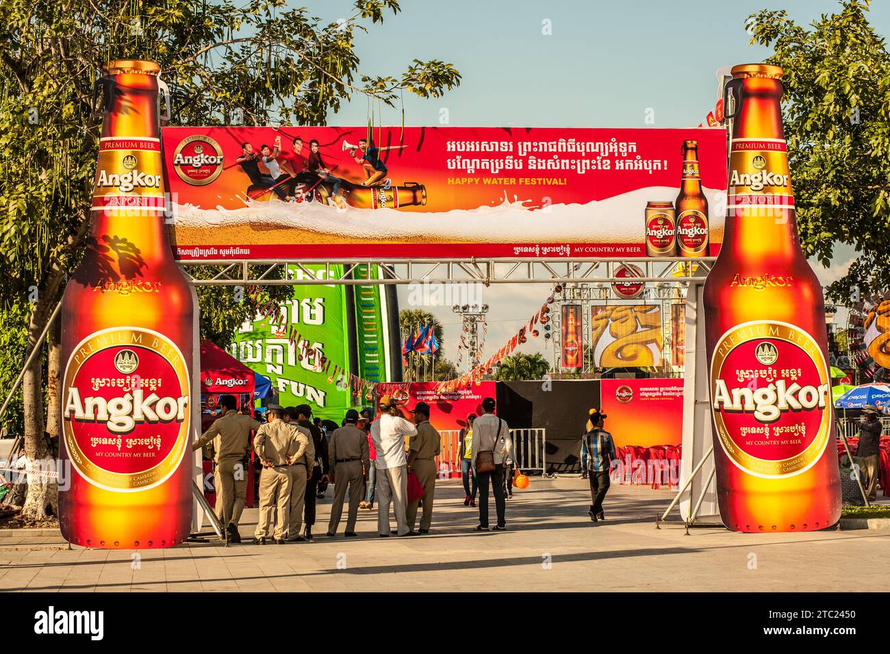 Bilingual "Happy Water Festival" sign, advertisement by Angkor Beer ...